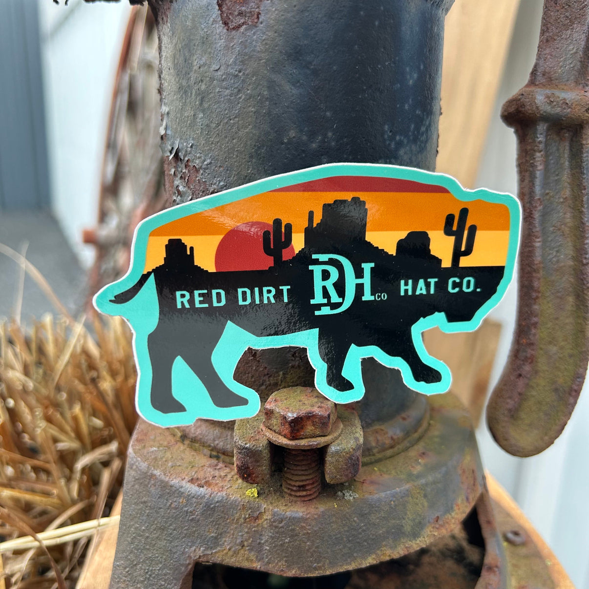Red Dirt Hat Co. Billboard Sticker – Lucknow Skin Shop and Boot Barn