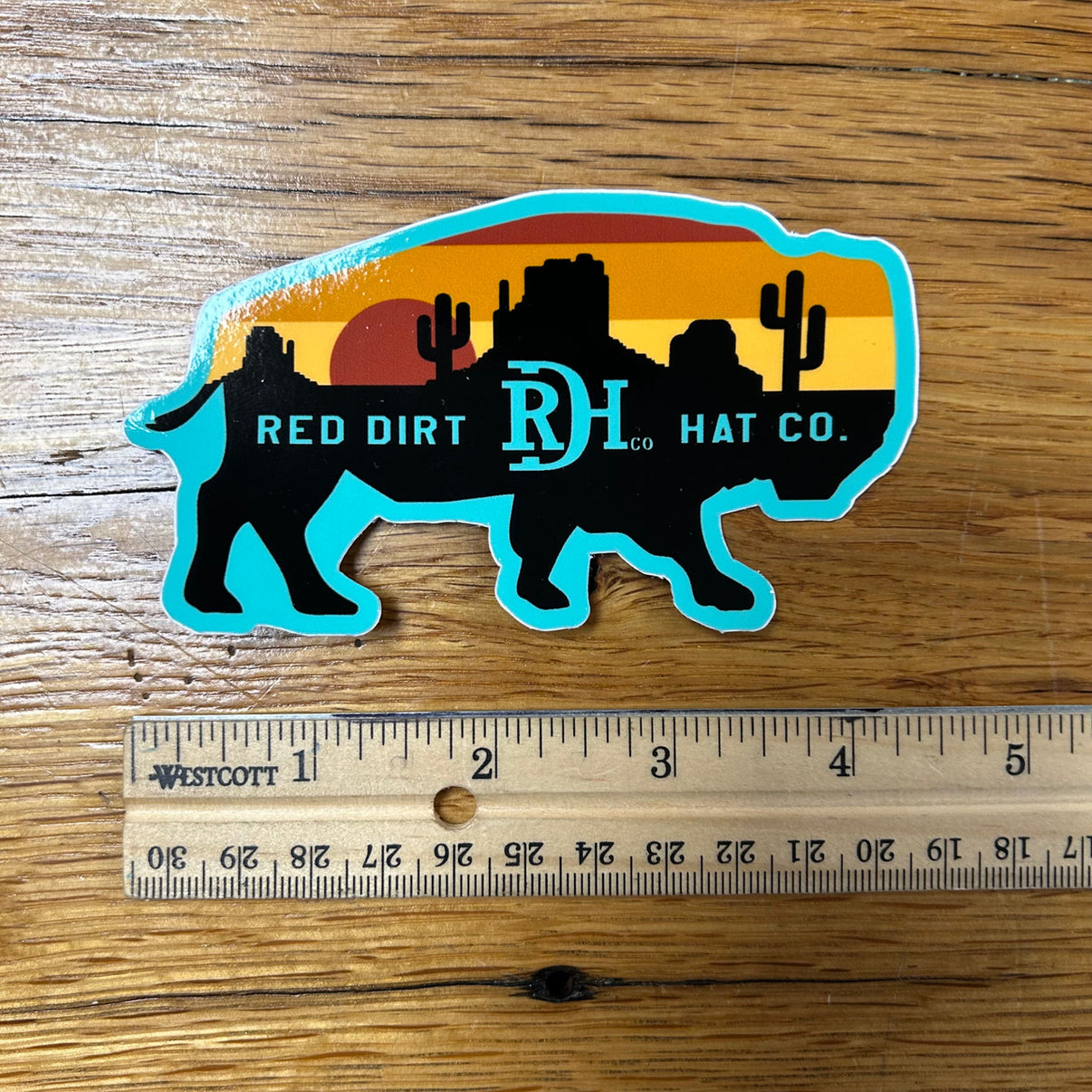 Red Dirt Hat Co. Billboard Sticker – Lucknow Skin Shop and Boot Barn
